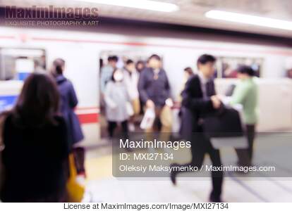 Photo of People getting off subway train in Tokyo Abstract concept ...