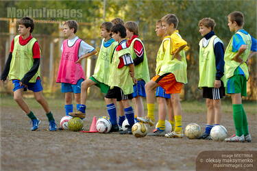 Photo of Children on a School Playground Practicing Soccer | Stock ...