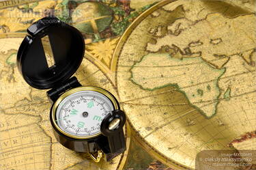 Photo of Compass on a World Map | Stock Image MXI20689