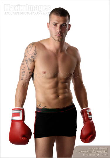 Photo of Man kickboxer With bare torso and boxing gloves | Stock Image ...