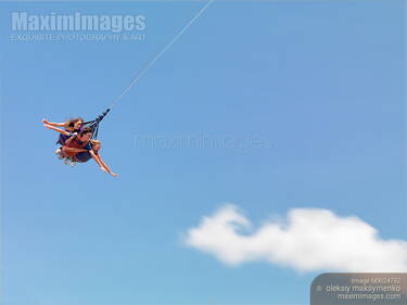 Photo of People Enjoying Free-Fall Swing | Stock Image MXI24752
