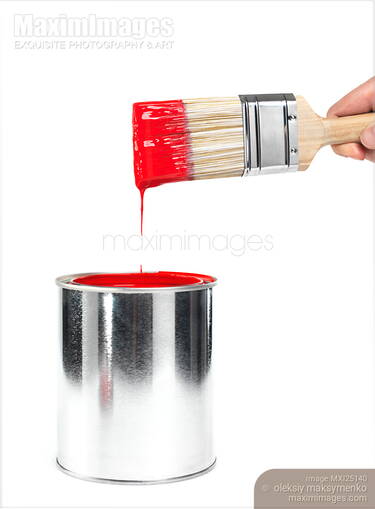 Photo of Person with paintbrush dipped in red paint | Stock Image MXI25140