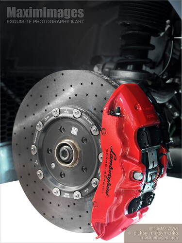 Photo of Sports car front brakes ceramic disc and caliper | Stock Image ...