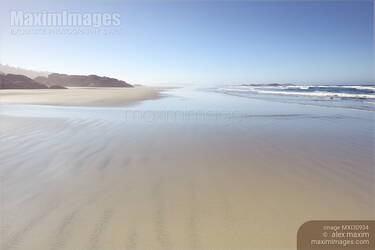 Photo of Surreal scenery of the sandy ocean shore at Pacific Rim ...